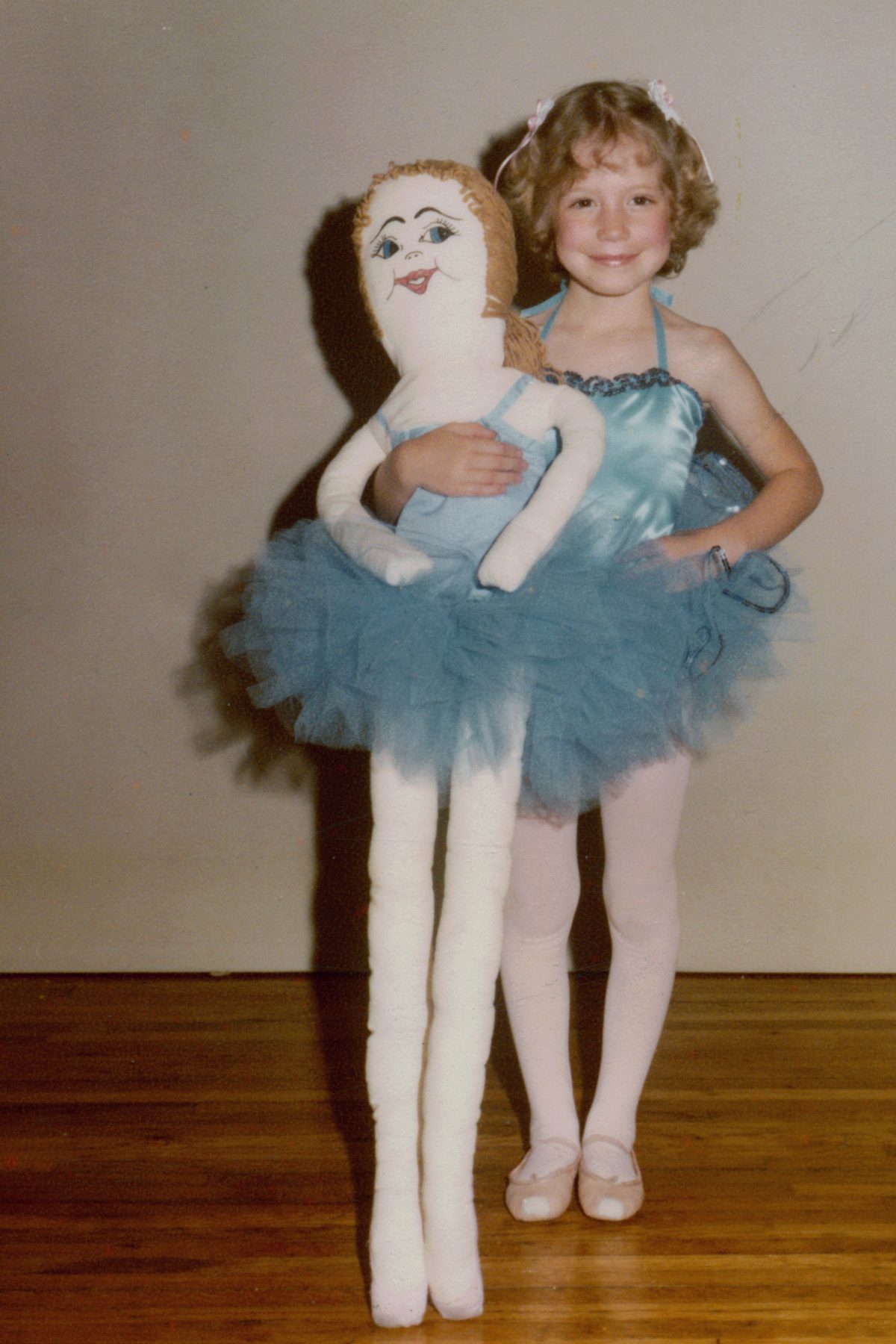 Erica in ballet with doll – Wilson Family Album