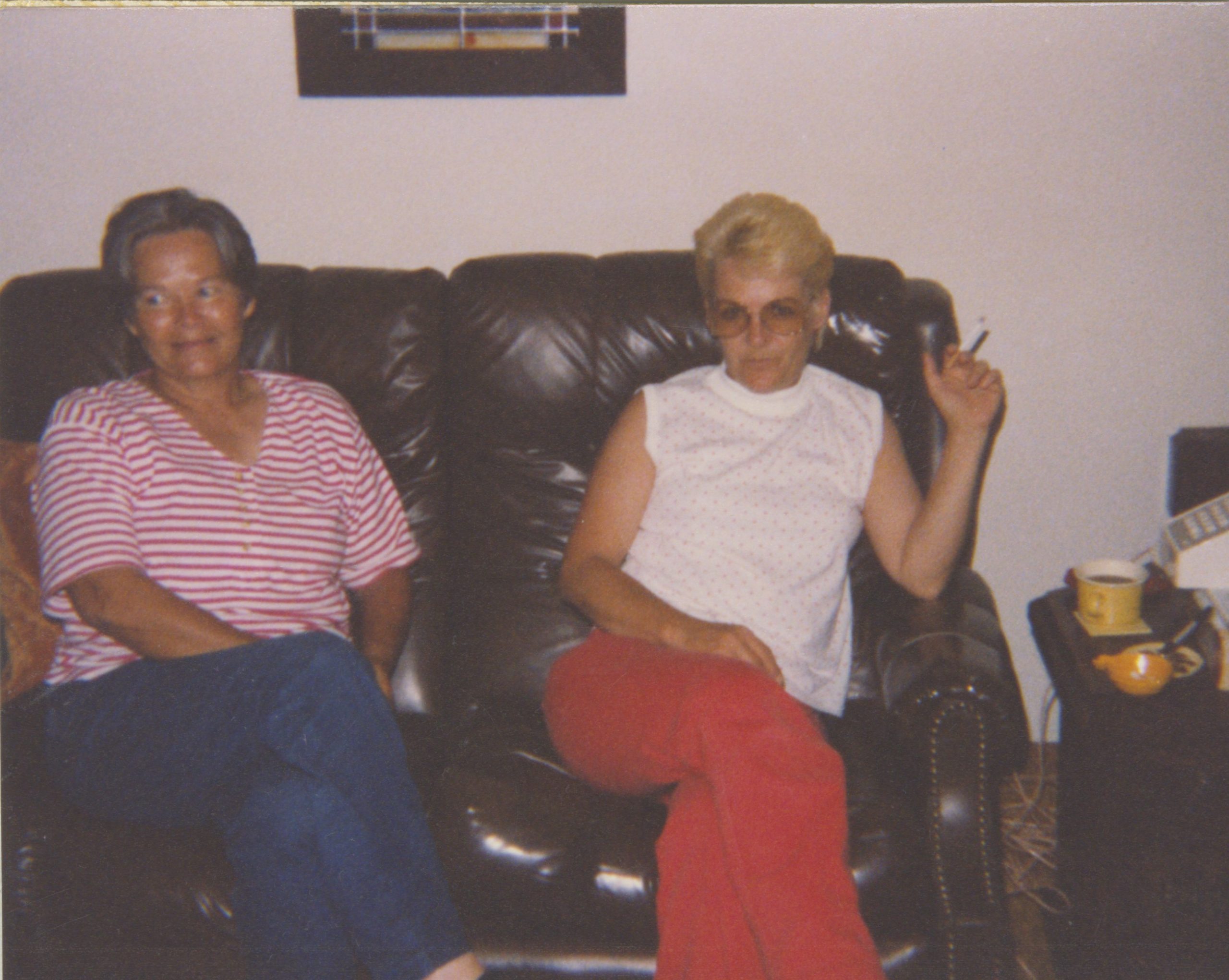Alma and Violet on the couch – Wilson Family Album